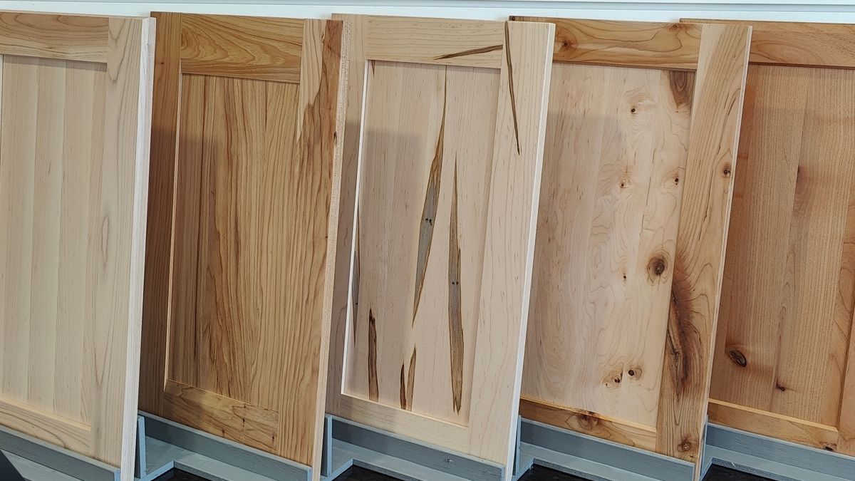 What are shaker style cabinet doors with solid wood panels?